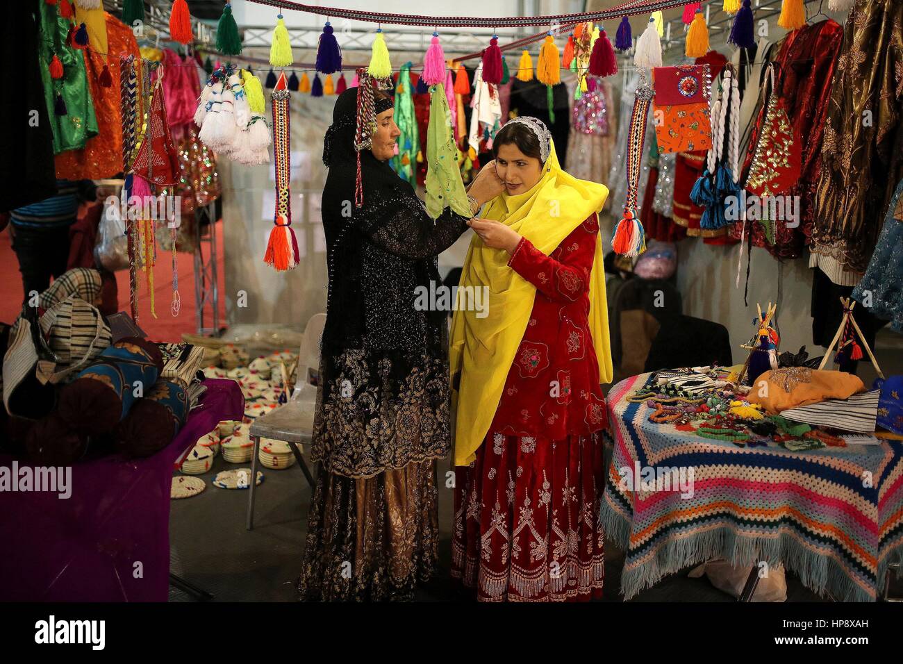 Tehran, Iran. 19th Feb, 2017. Iranian women wearing local costumes are ...