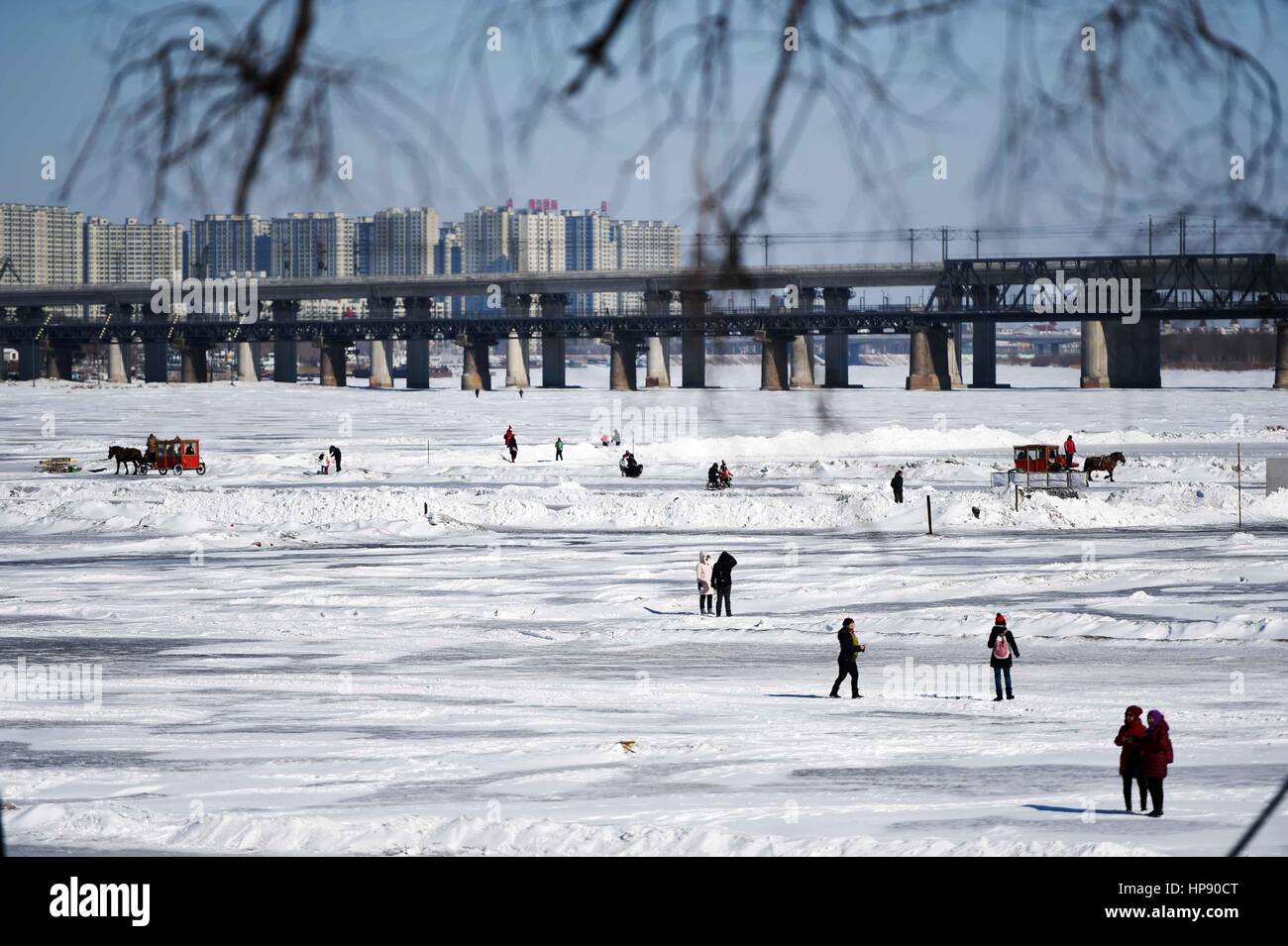 Harbin, China's Heilongjiang Province. 20th Feb, 2017. Tourists enjoy ...