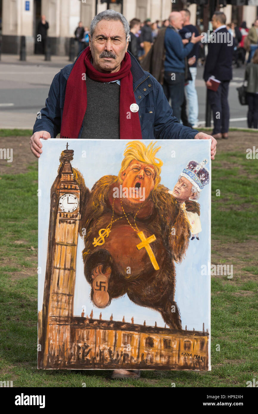 London, UK. 20th Feb, 2017. Political artist Kaya Mar holds up an oil ...