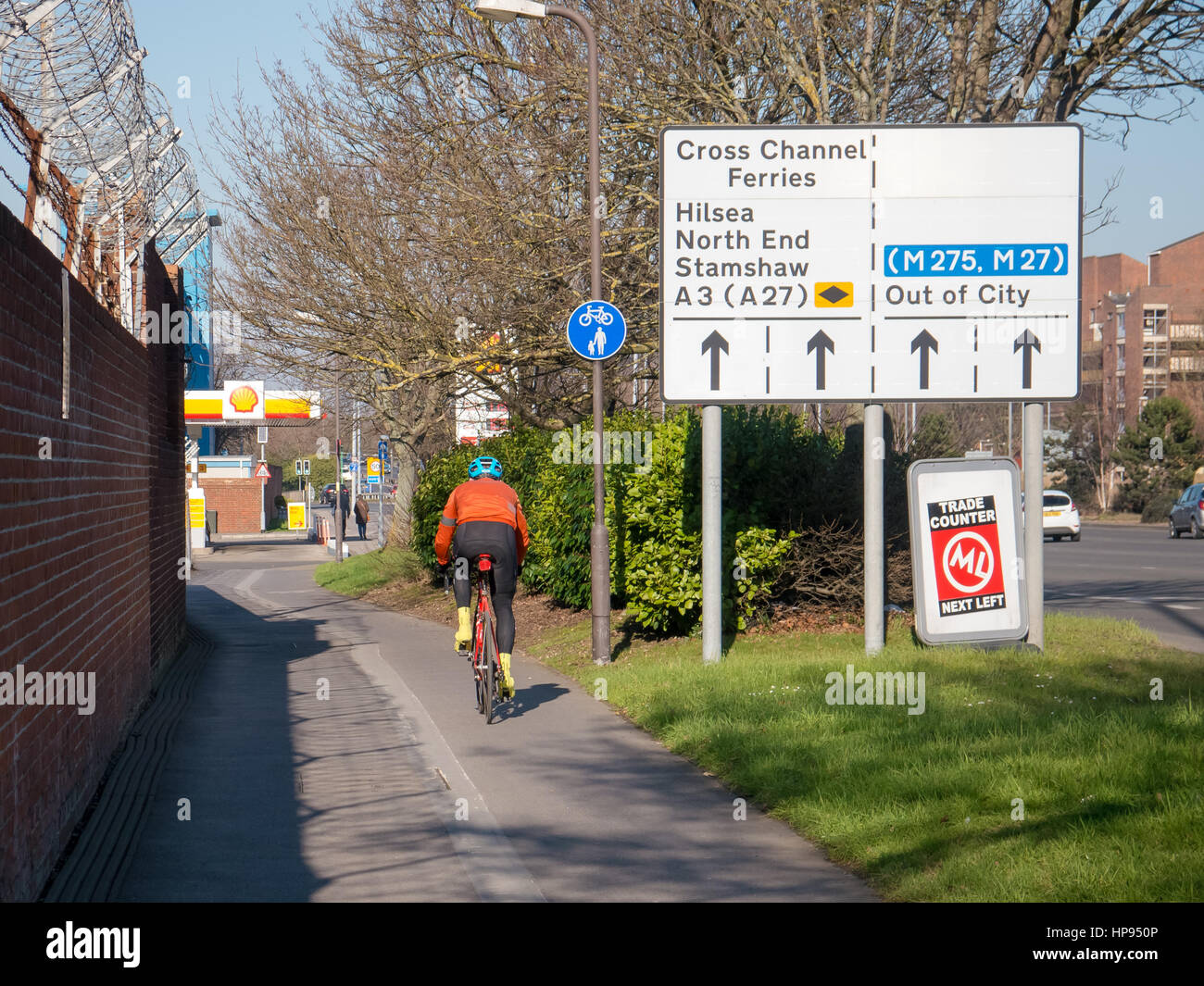 Cyclist riding on pavement hi-res stock photography and images - Alamy