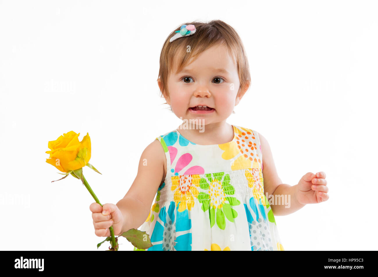 Little cute girl with beautiful yellow rose, romantic gift Stock Photo ...