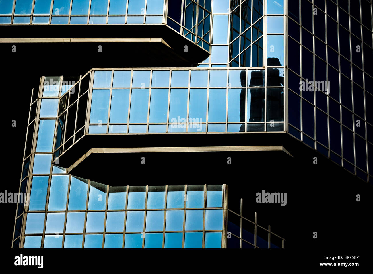 Windows of commercial building in Hong Kong Stock Photo - Alamy