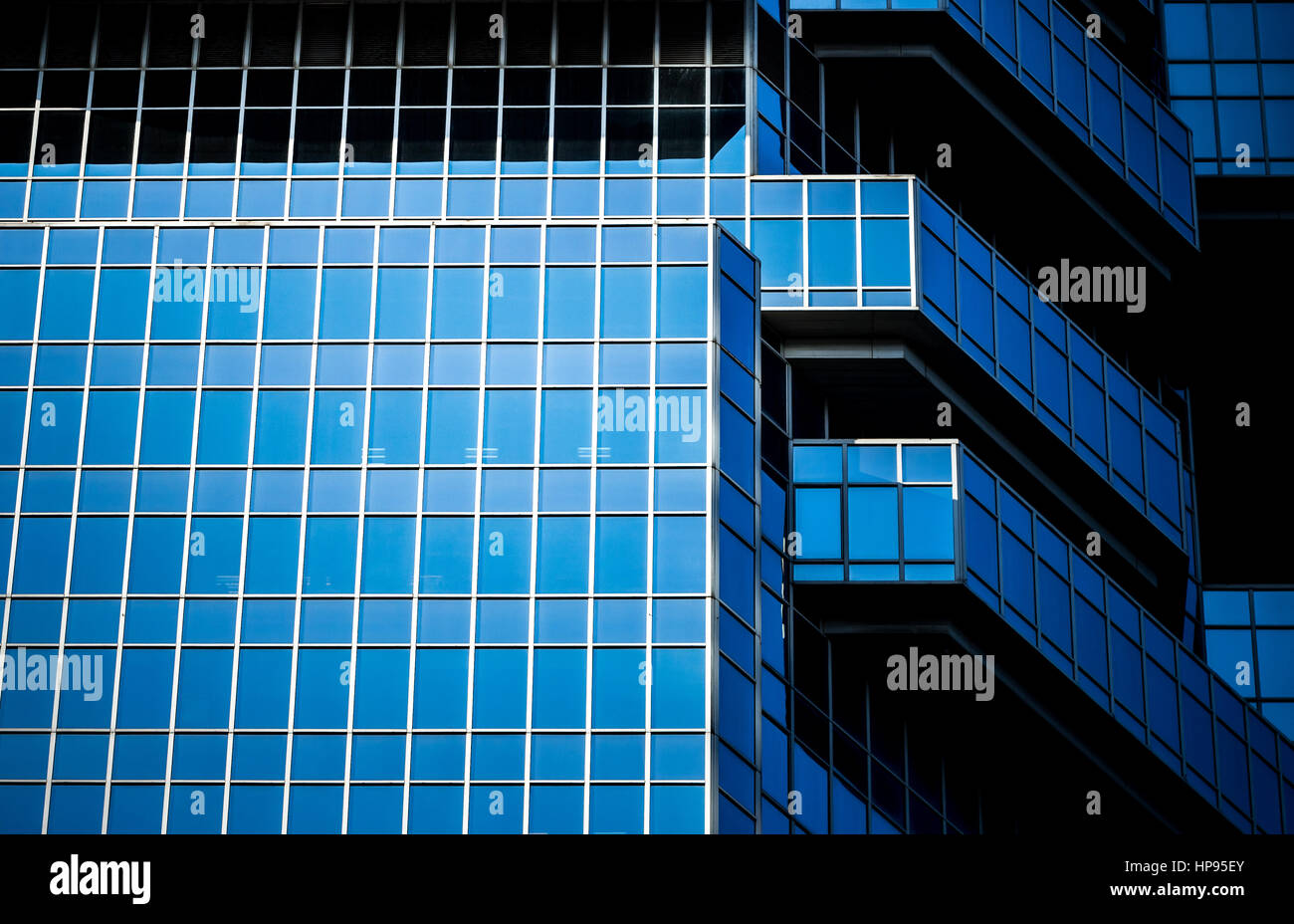 Windows of commercial building in Hong Kong Stock Photo - Alamy