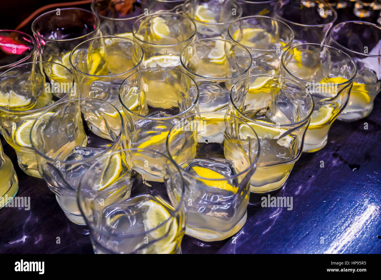 Many alcoholic drinks with lemon Stock Photo - Alamy