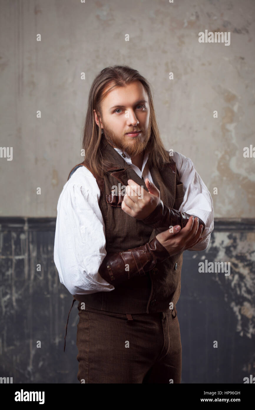Handsome male Steam punk. Retro man portrait over grunge background ...