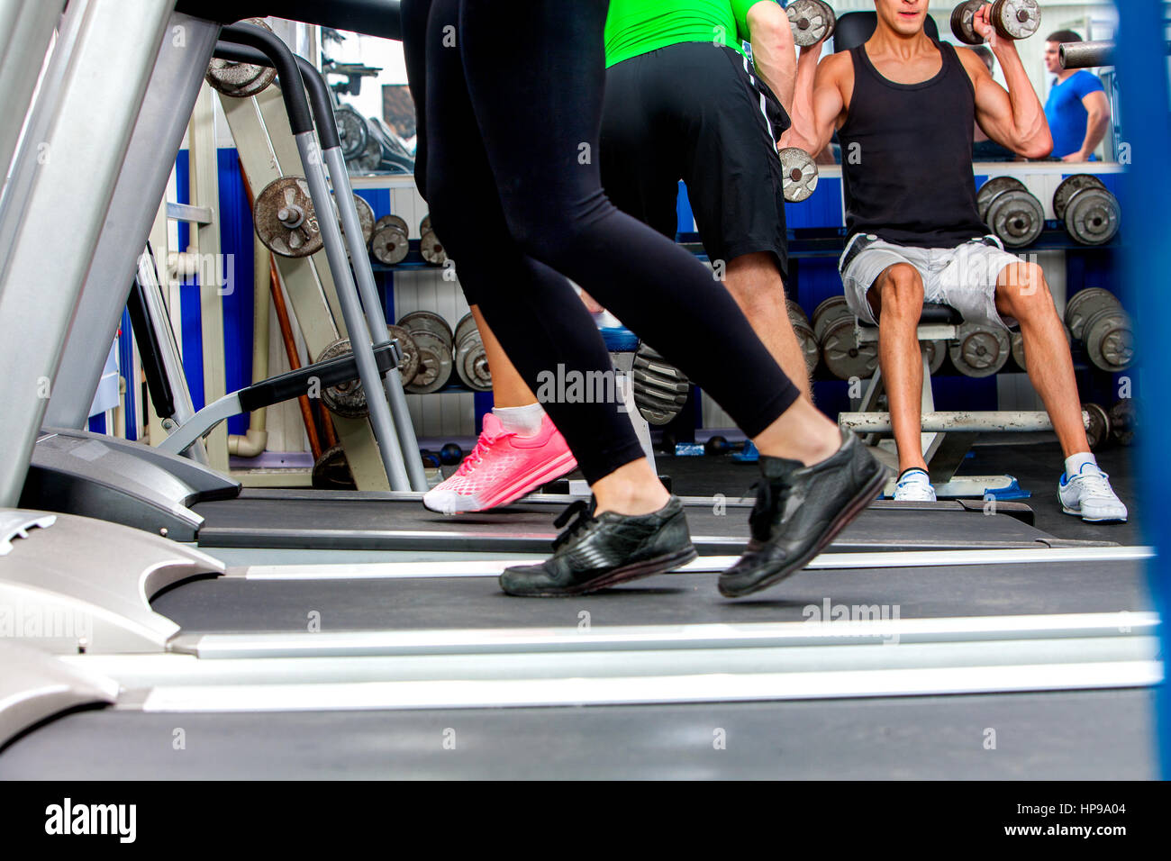 Treadmill and group of legs running group people sport gym Stock Photo ...