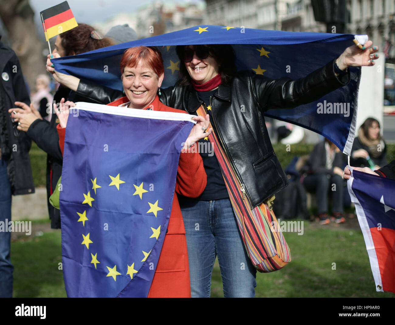 Participants take part in a 'Flag Mob' in Parliament Square, central ...
