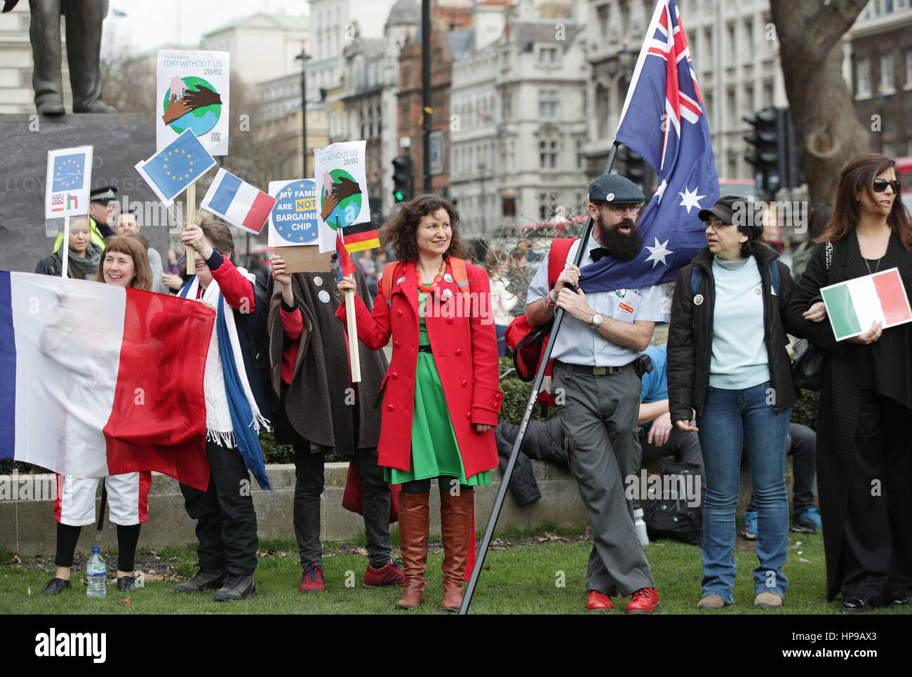 Participants take part in a 'Flag Mob' in Parliament Square, central ...