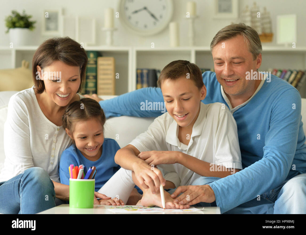 Parents children drawing together hi-res stock photography and images ...