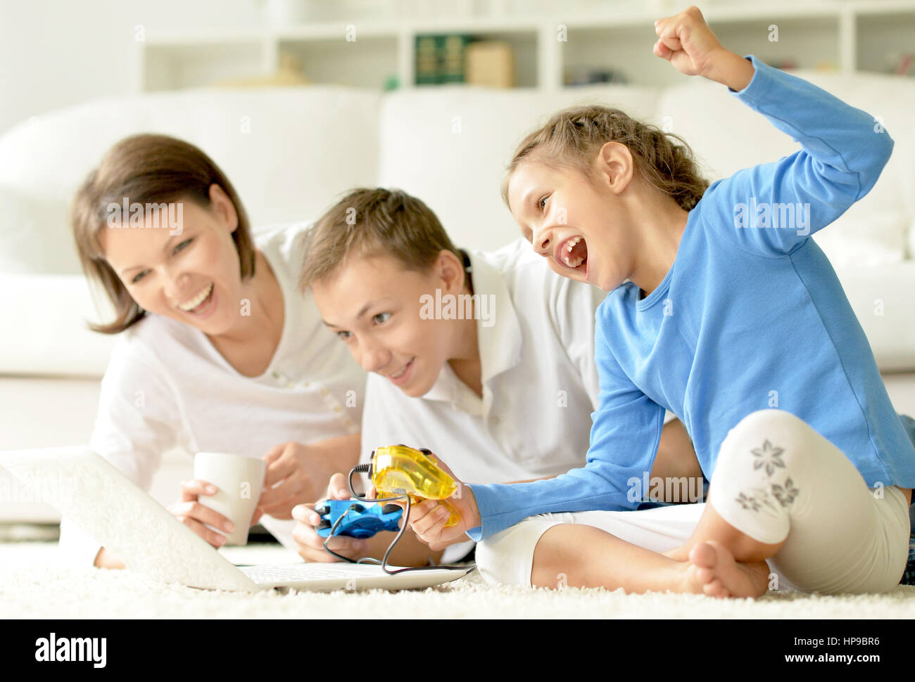 family playing computer games Stock Photo - Alamy