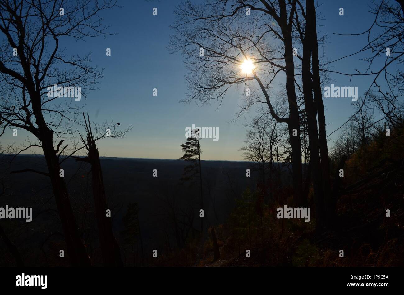 Sun from the side of a mountain Stock Photo - Alamy