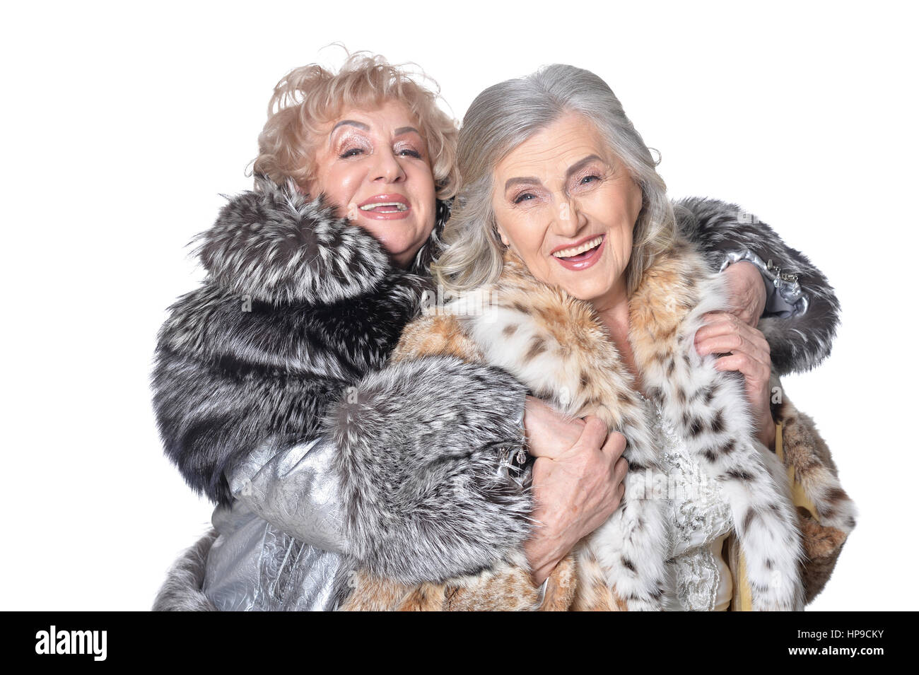 Two senior women isolate on white Stock Photo - Alamy