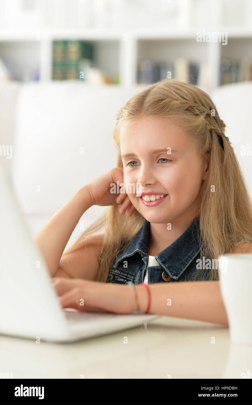 little girl using laptop Stock Photo - Alamy