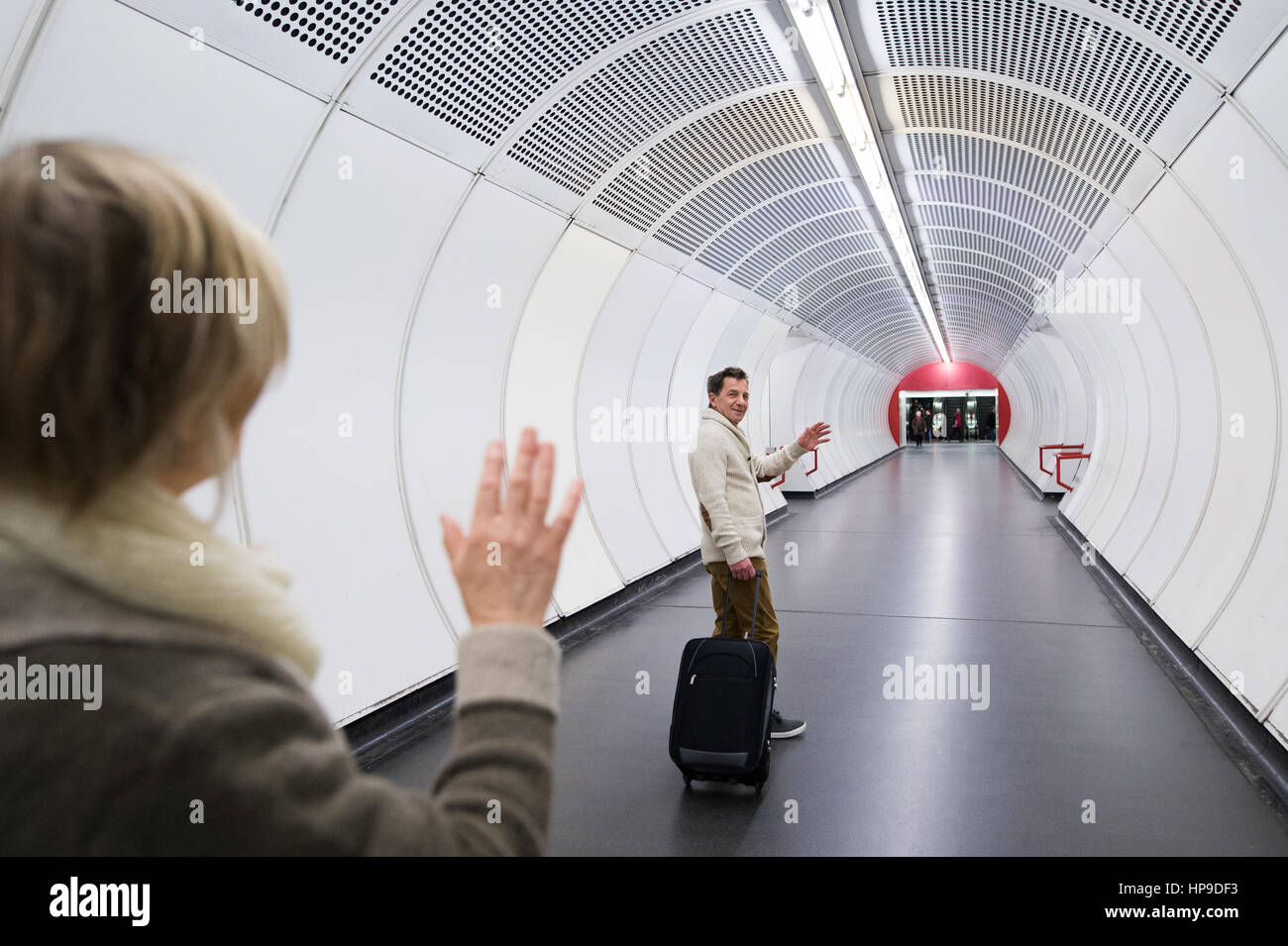 Couple saying goodbye hi-res stock photography and images - Alamy