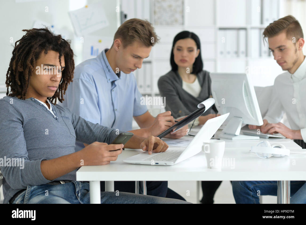 young people colleagues at office Stock Photo - Alamy