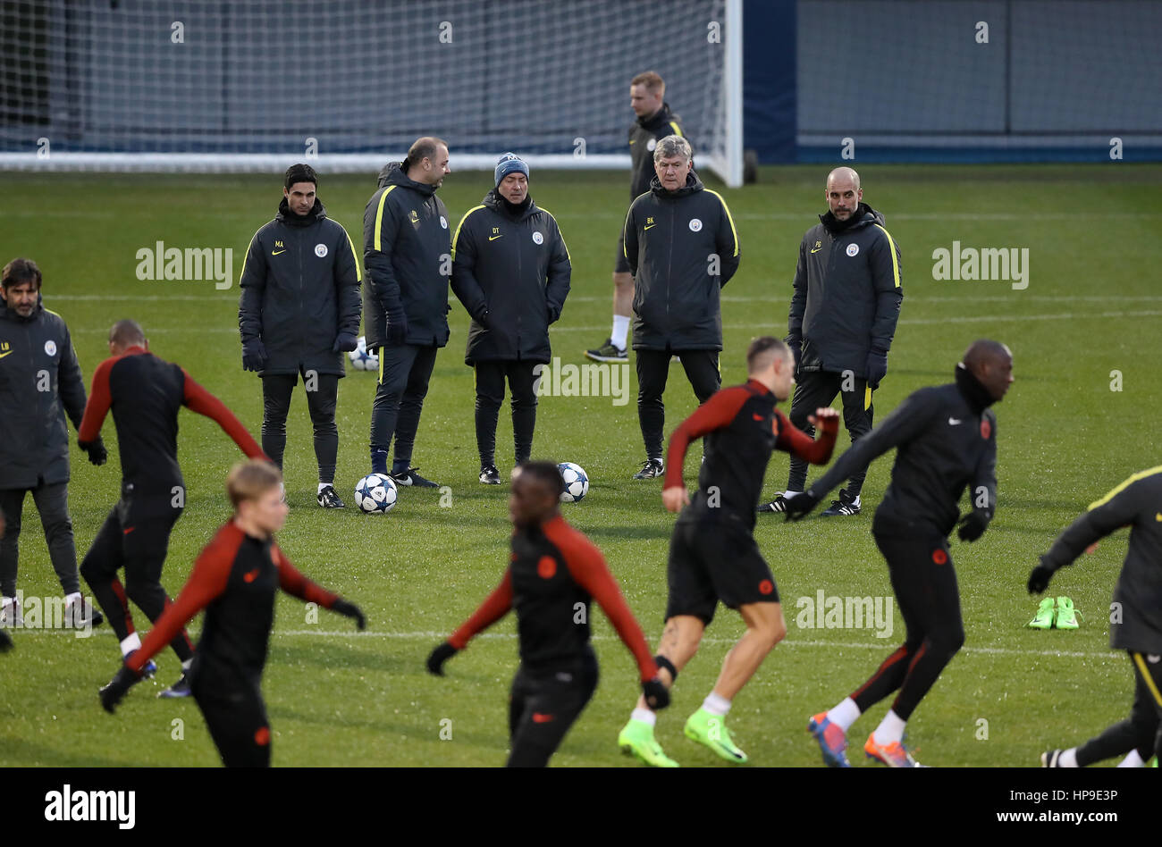 Manchester City manager Pep Guardiola (right), Assistant Brian Kidd ...