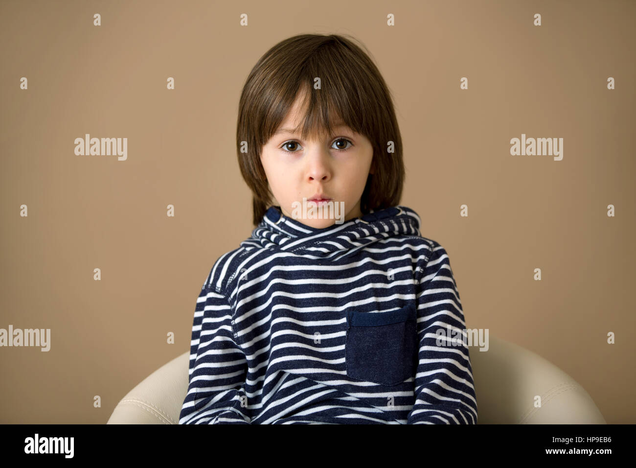 Sweet preschool boy, making faces with different emotion, isolated ...