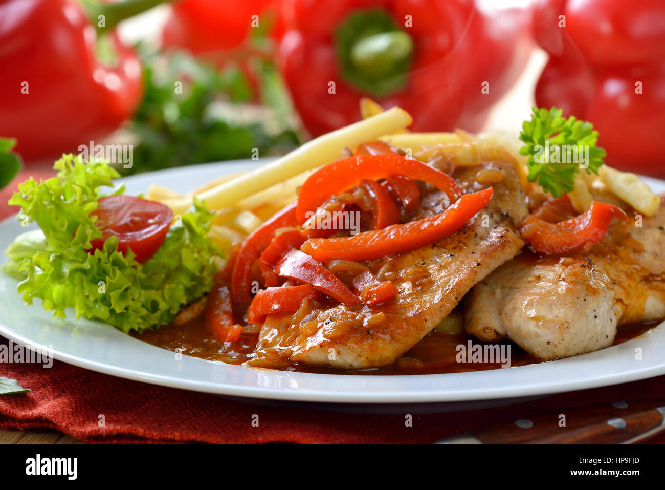 Hot escalope of turkey with red pepper sauce (so-called ...