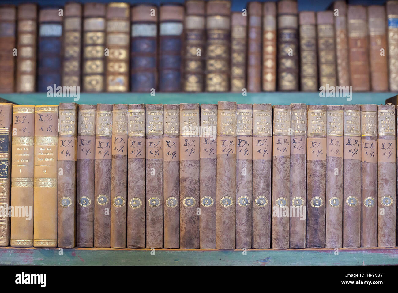 historic old books in ancient library, wooden bookshelf Stock Photo - Alamy