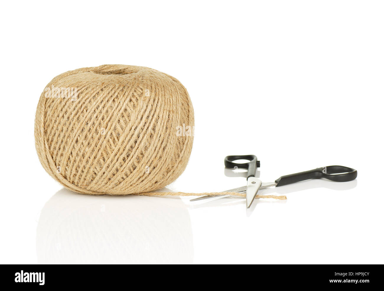 Ball of Natural String With Loose End and Scissors on White Background ...