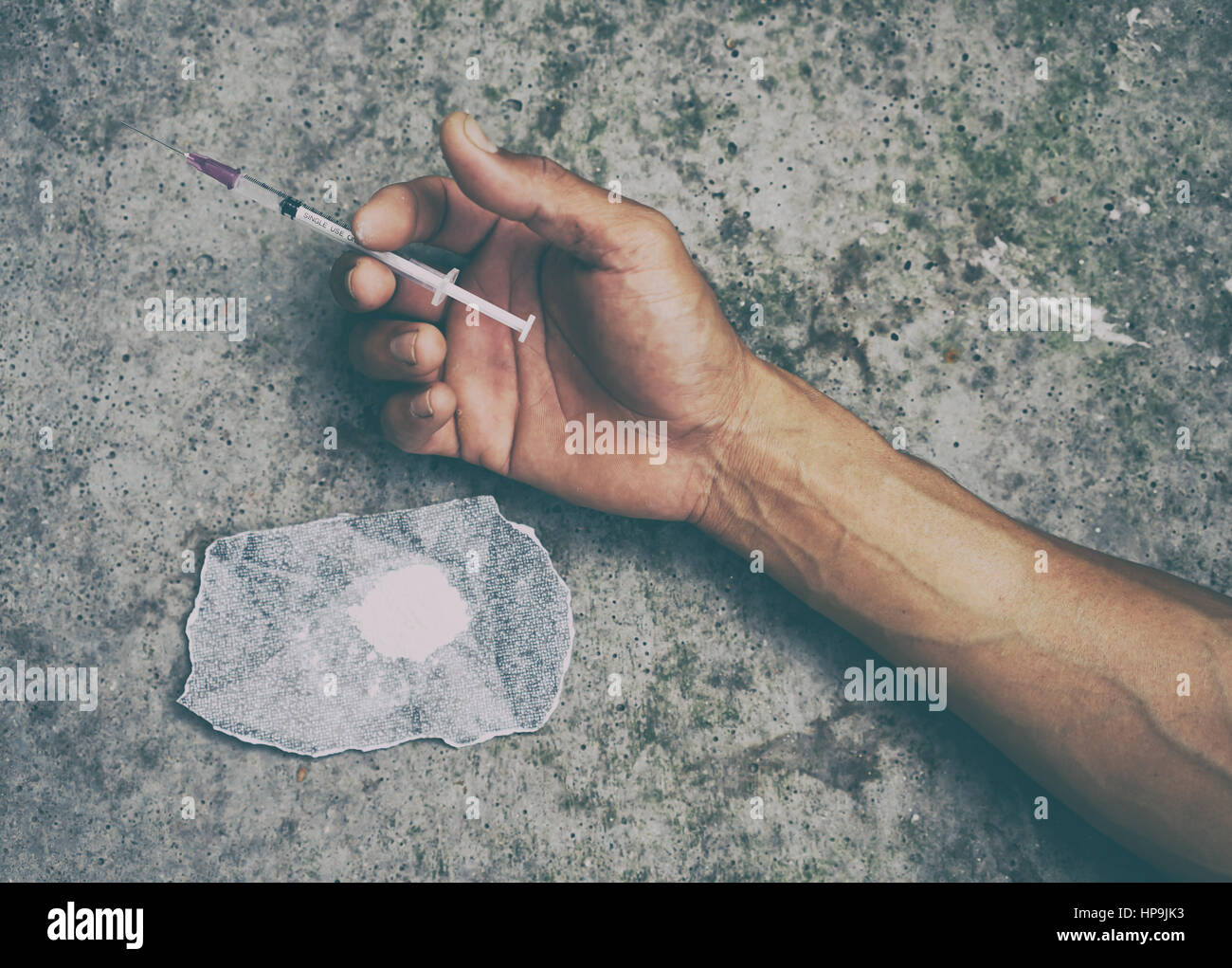 drug addict man with syringe in action Stock Photo - Alamy