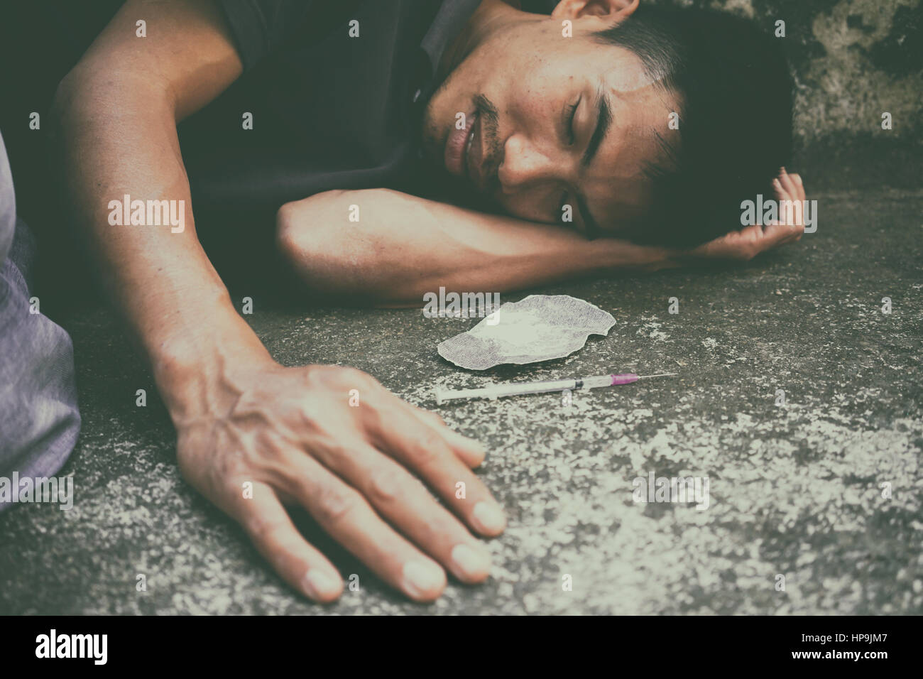 drug addict man with syringe in action Stock Photo - Alamy