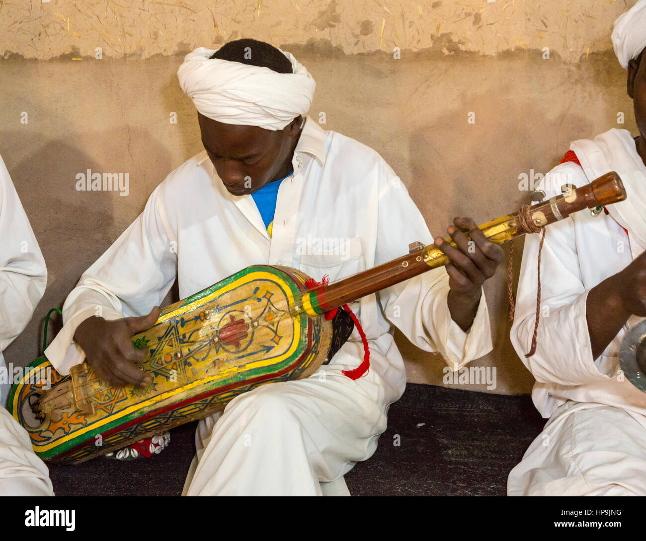 Merzouga, Morocco. Gnaoua Musician Playing his Gimbrie, or Hajouj Stock ...