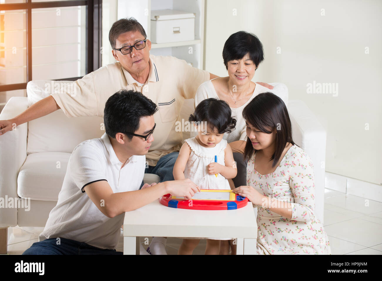multi generation asian family at home Stock Photo - Alamy