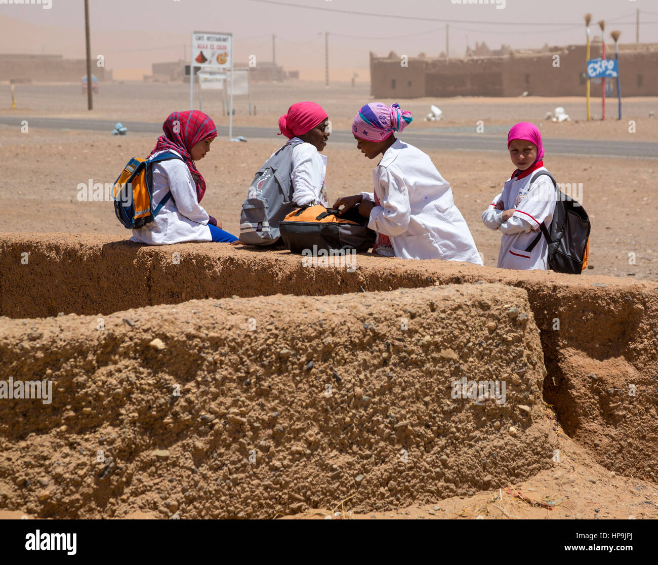 Merzouga, Morocco. Teenage Schoolgirls Waiting for School Bus Stock ...
