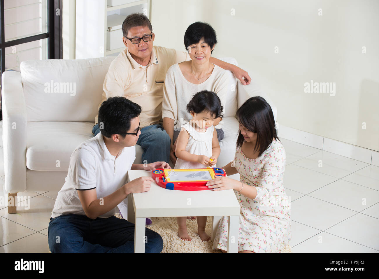 multi generation asian family at home Stock Photo - Alamy