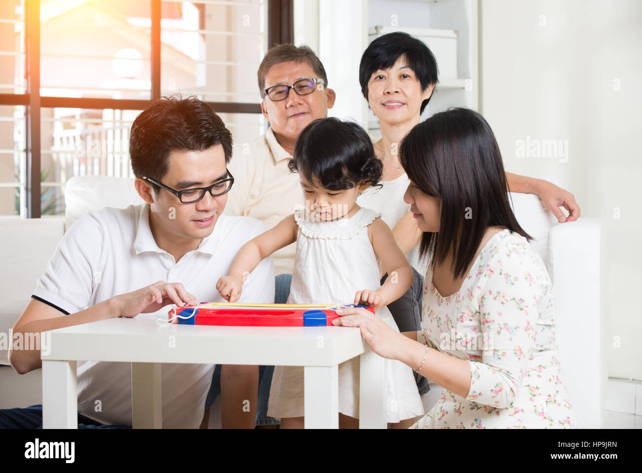 multi generation asian family at home Stock Photo - Alamy