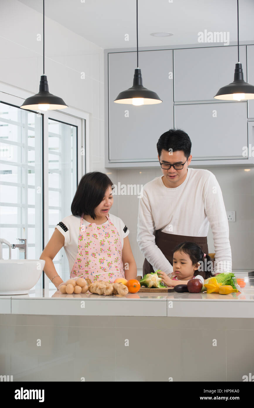 asian family cooking at kitchen Stock Photo - Alamy