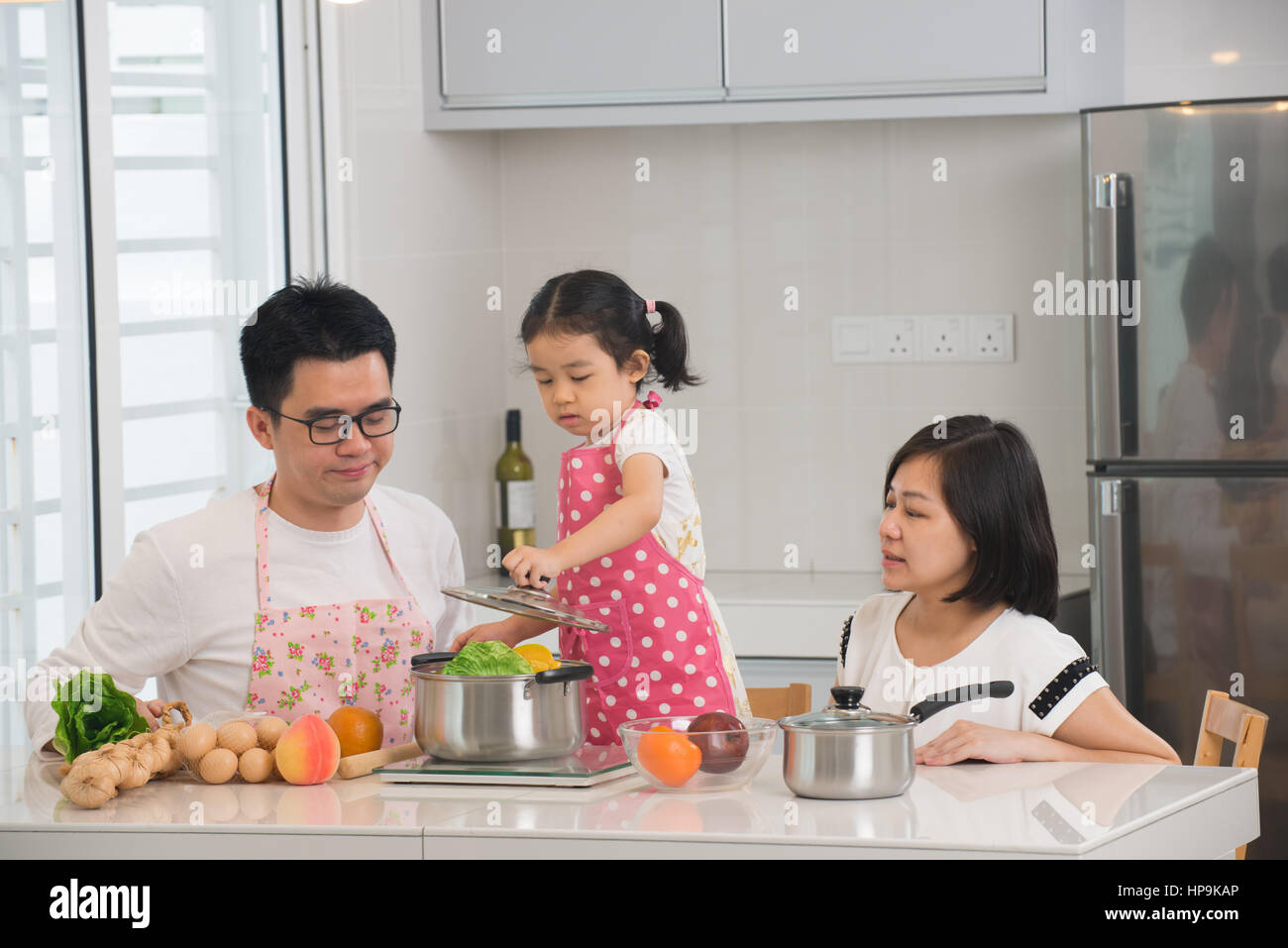 asian family cooking at kitchen Stock Photo - Alamy