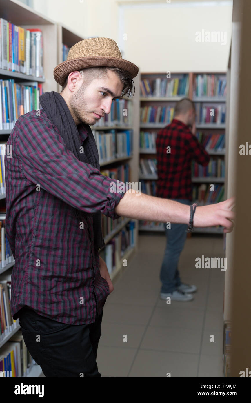 College Student, Student, Book. Student in library at university Stock ...
