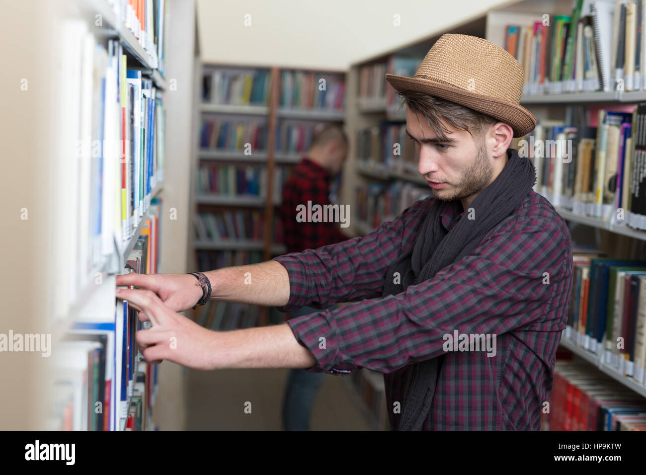 College Student, Student, Book. Student in library at university Stock ...