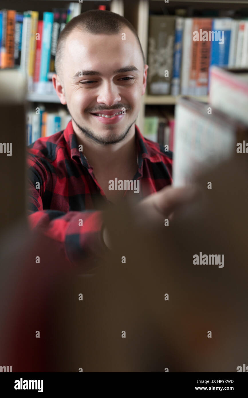 College Student, Student, Book. Student in library at university Stock ...