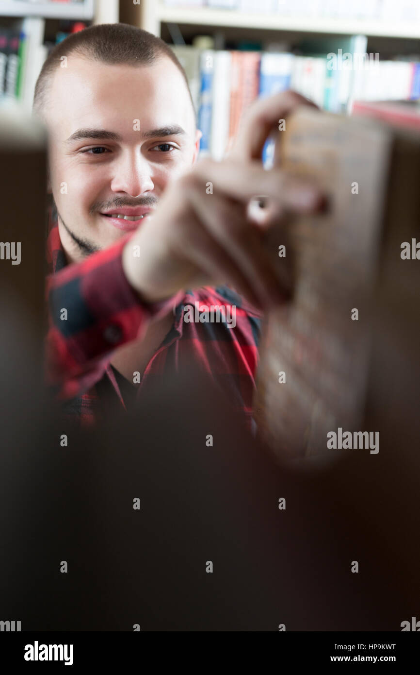 College Student, Student, Book. Student in library at university Stock ...