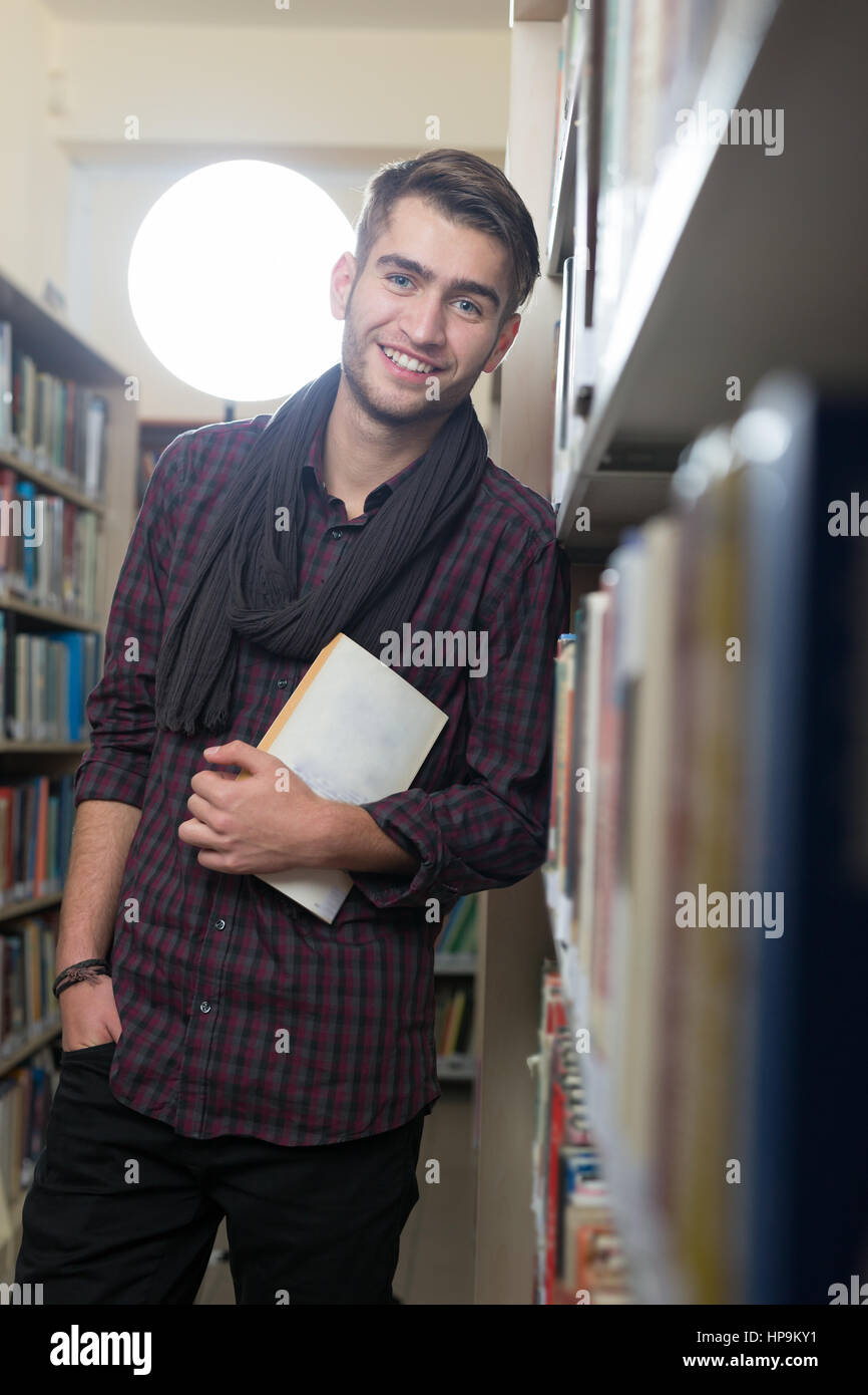 College Student, Student, Book. Student in library at university Stock ...