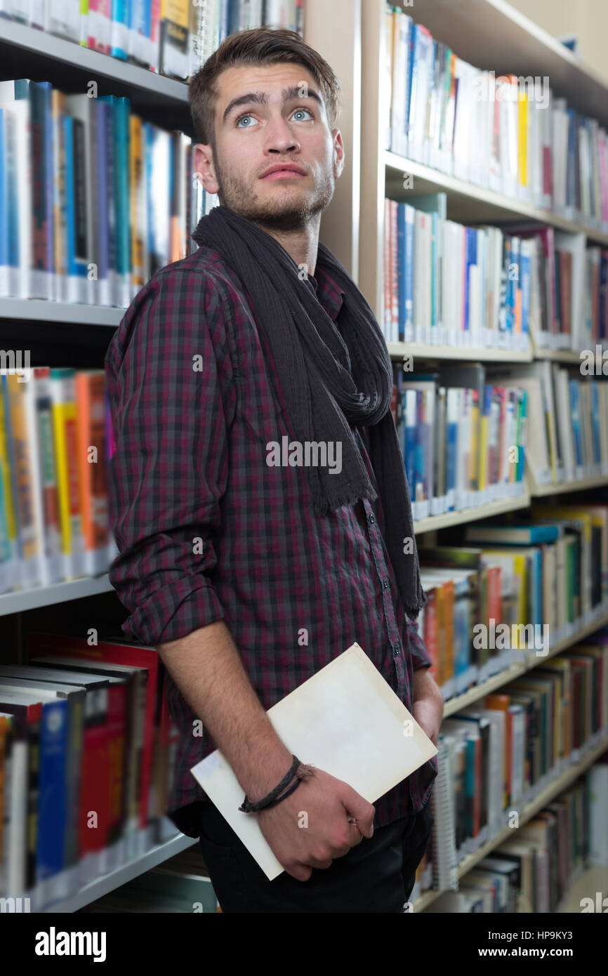 College Student, Student, Book. Student in library at university Stock ...