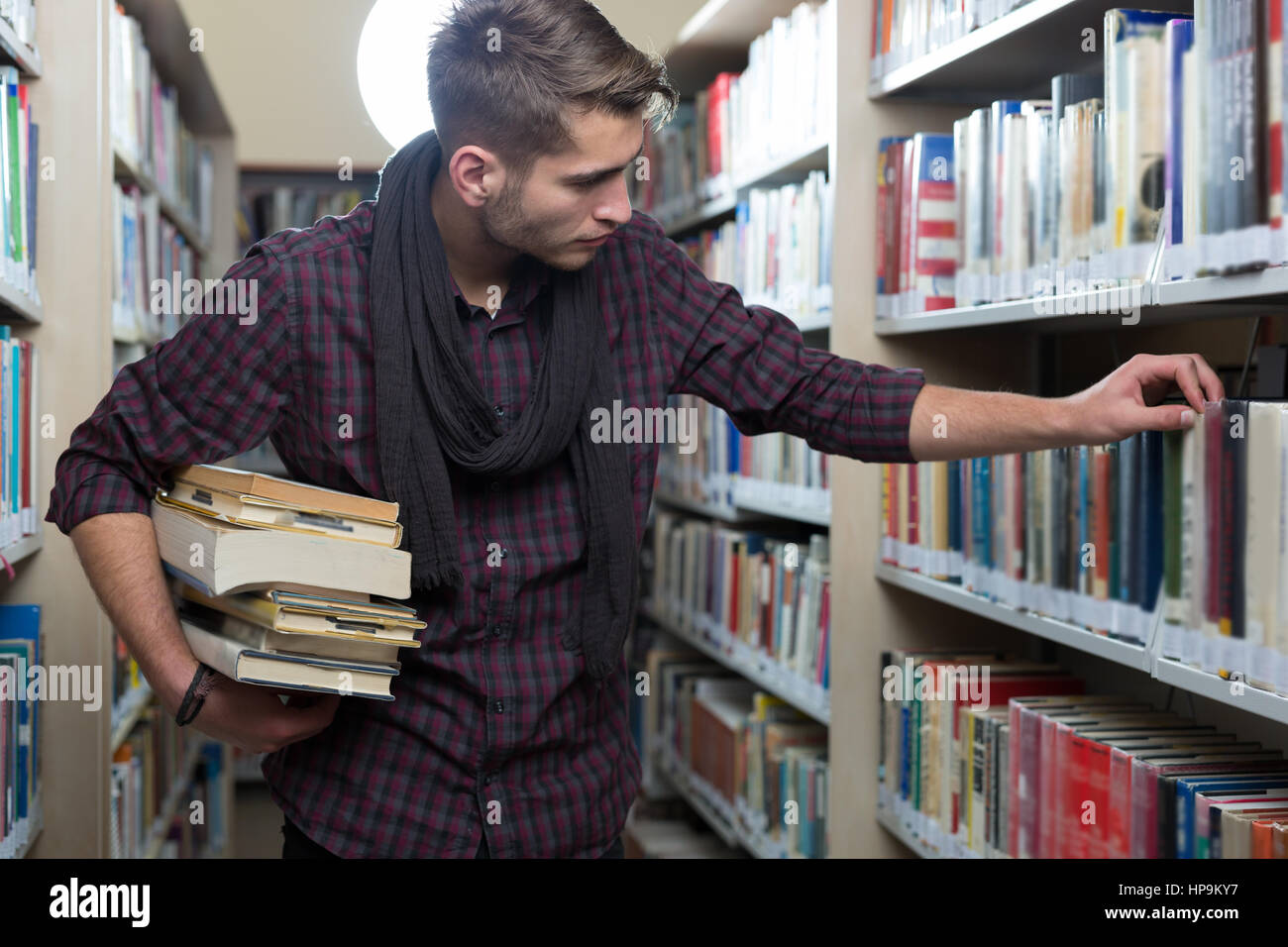 College Student, Student, Book. Student in library at university Stock ...