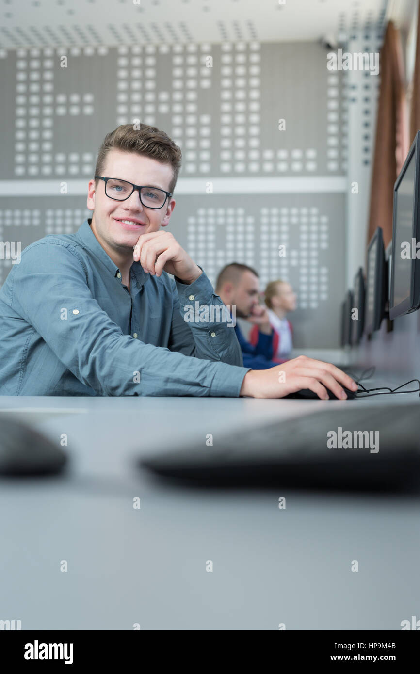 man working in the computer room at university Stock Photo - Alamy