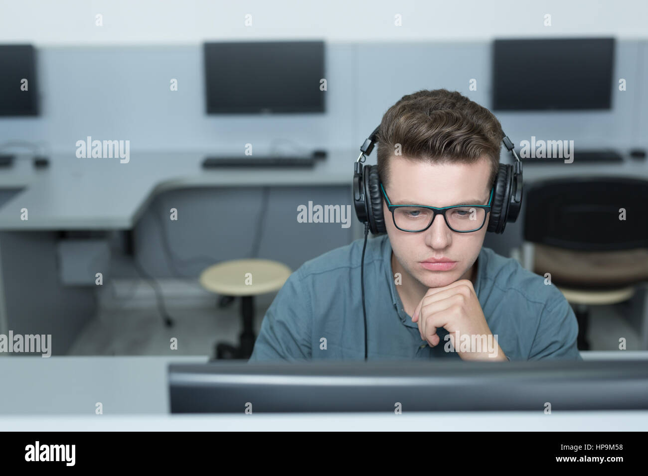 man working in the computer room at university Stock Photo - Alamy