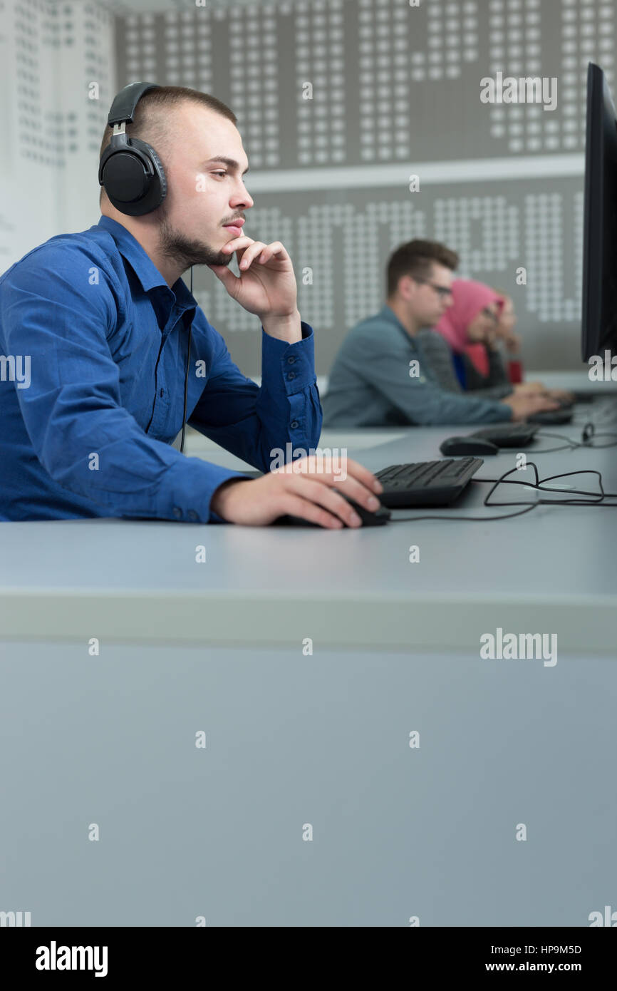 man working in the computer room at university Stock Photo - Alamy