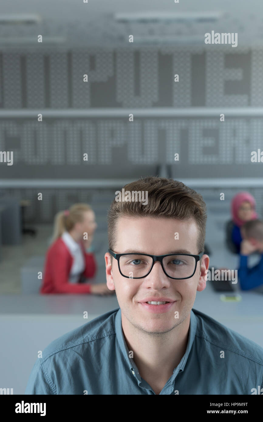 Portrait of a male student in an IT room Stock Photo - Alamy