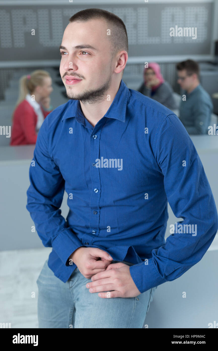 Portrait of a male student in an IT room Stock Photo - Alamy