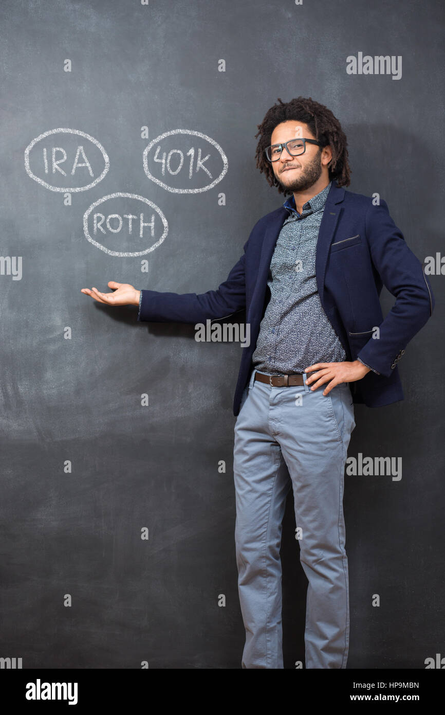 Savings concept. Portrait of man on chalkboard with different saving ...