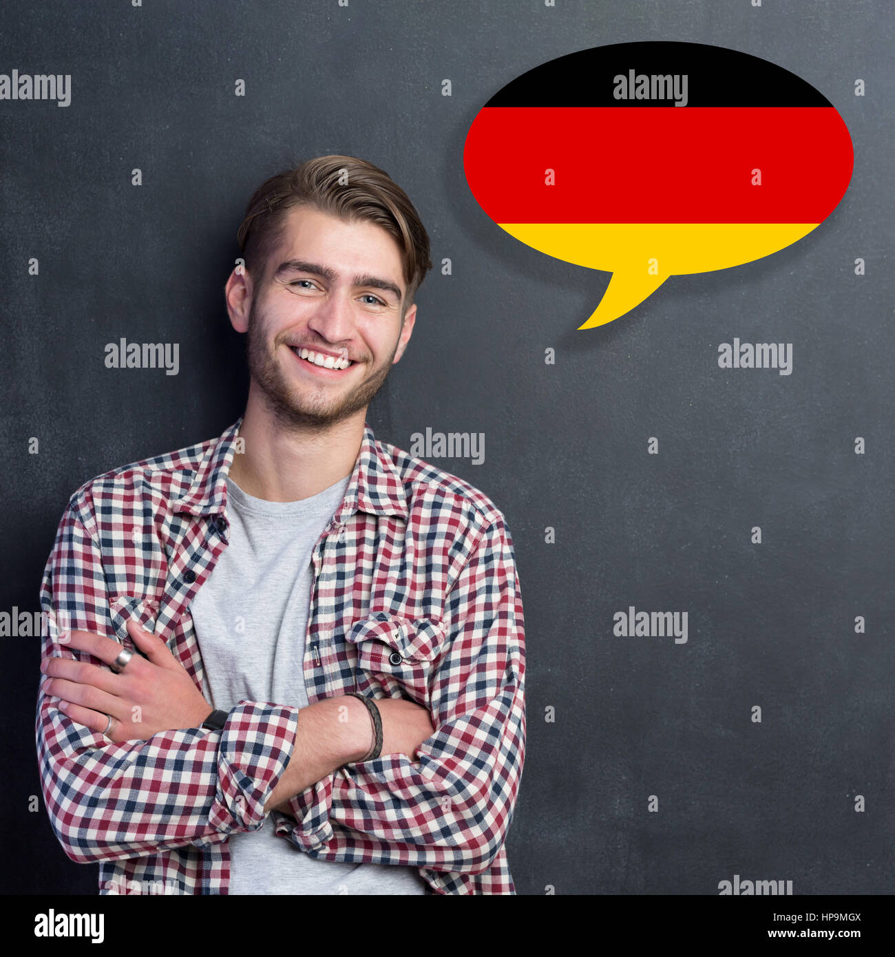 Man learn speaking german in bubble on chalkboard Stock Photo - Alamy