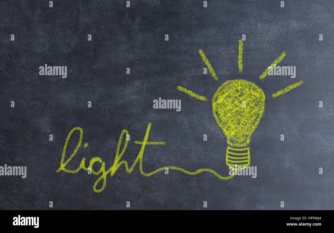 idea bulb on chalkboard background. light concept Stock Photo - Alamy