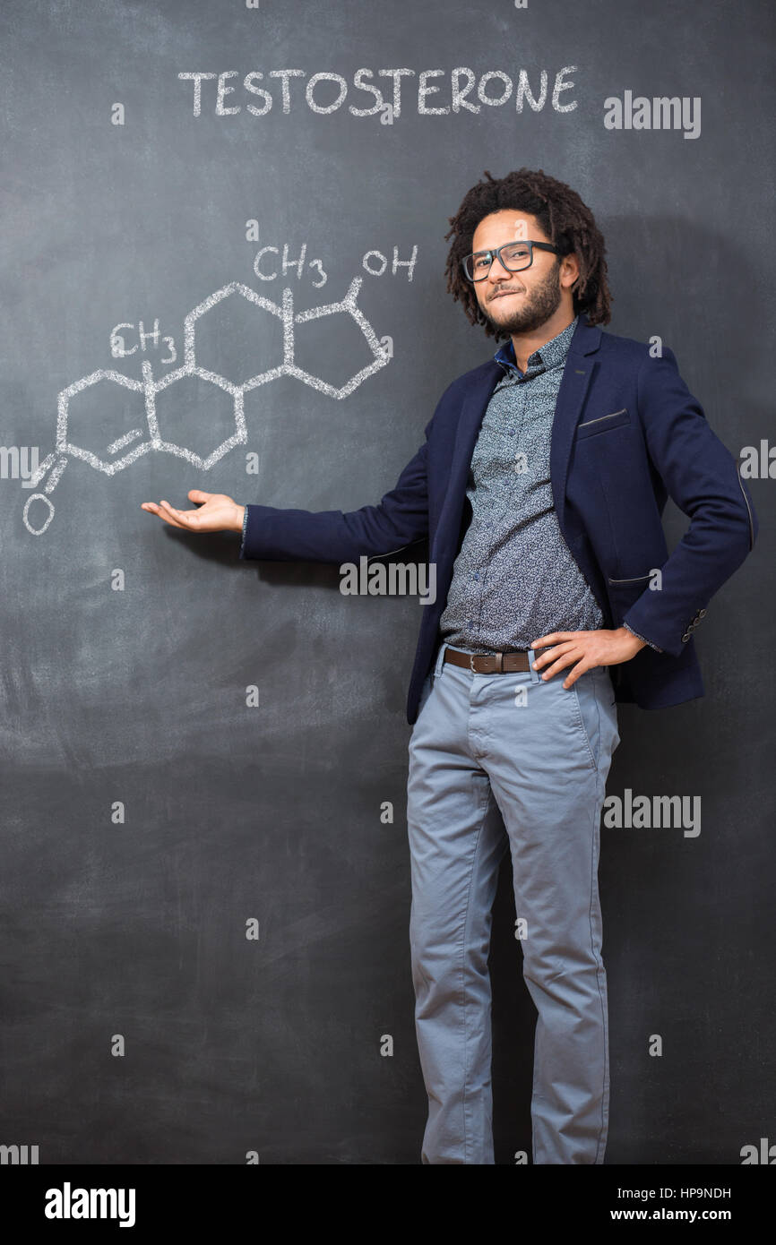 chemical structure of testosterone molecule drawn on chalkboard ...