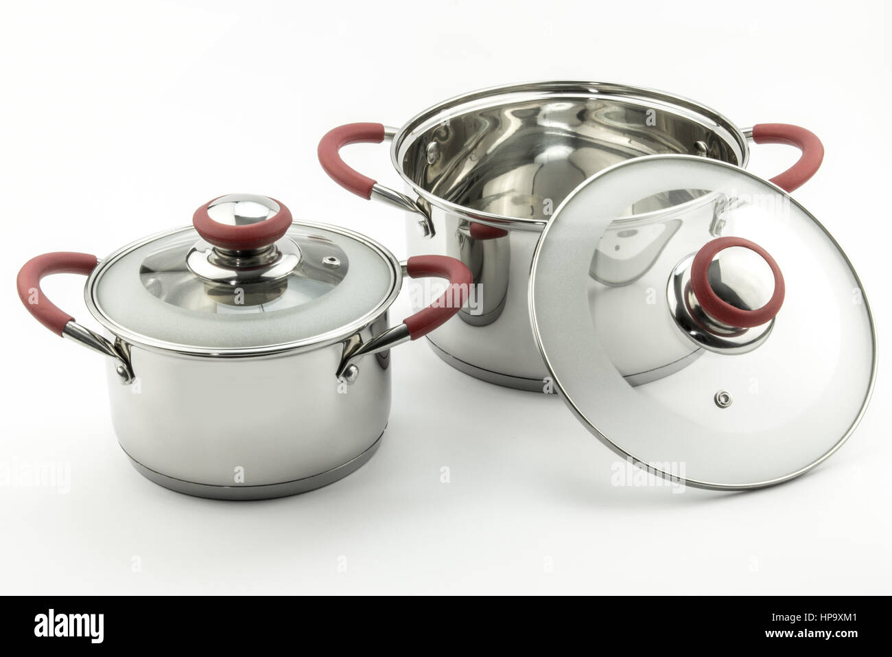 Kitchen cooking pots with glass lids isolated on white background Stock ...